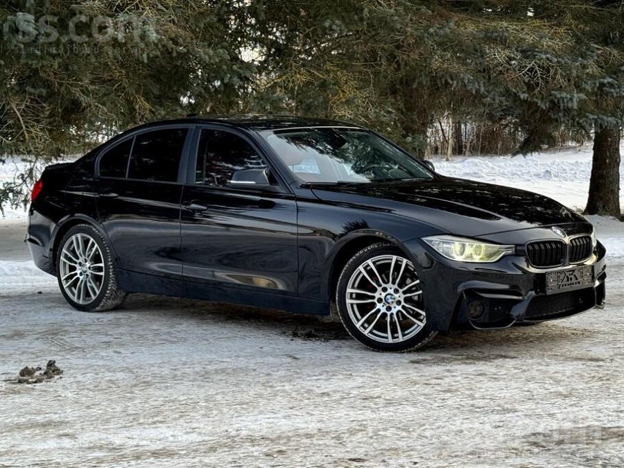 Black BMW 318 2014 in Jelgava, with an engine capacity of 2.00 L and mileage of 243 thousand km for 10800 €, photo 9 on AUTOMOTO.COM.LV