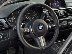 Black BMW 318 2014 in Jelgava, with an engine capacity of 2.00 L and mileage of 243 thousand km for 10800 €, photo 21 on AUTOMOTO.COM.LV