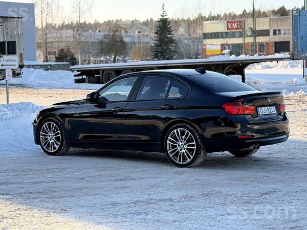 Black BMW 318 2014 in Jelgava, with an engine capacity of 2.00 L and mileage of 244 thousand km for 10800 €, photo 8 on AUTOMOTO.COM.LV