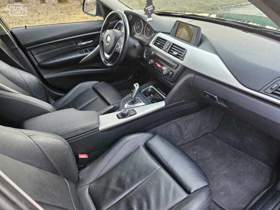 Black BMW 318 2015 in Sakiai, with an engine capacity of 2.00 L and mileage of 215 thousand km for 7499 €, photo 10 on AUTOMOTO.COM.LV