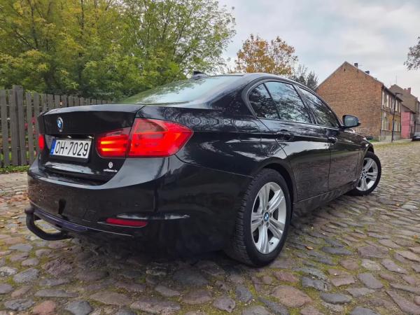 Black BMW 318 2015 in Jelgava, with an engine capacity of 2.00 L and mileage of 247 thousand km for 9900 €, photo 4 on AUTOMOTO.COM.LV