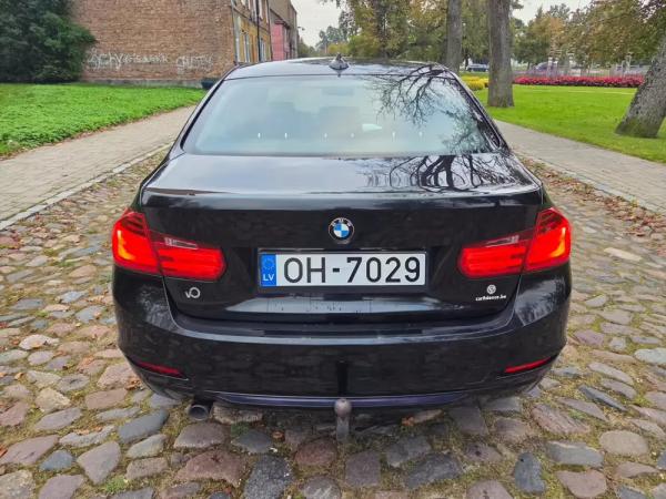Black BMW 318 2015 in Jelgava, with an engine capacity of 2.00 L and mileage of 247 thousand km for 9900 €, photo 6 on AUTOMOTO.COM.LV
