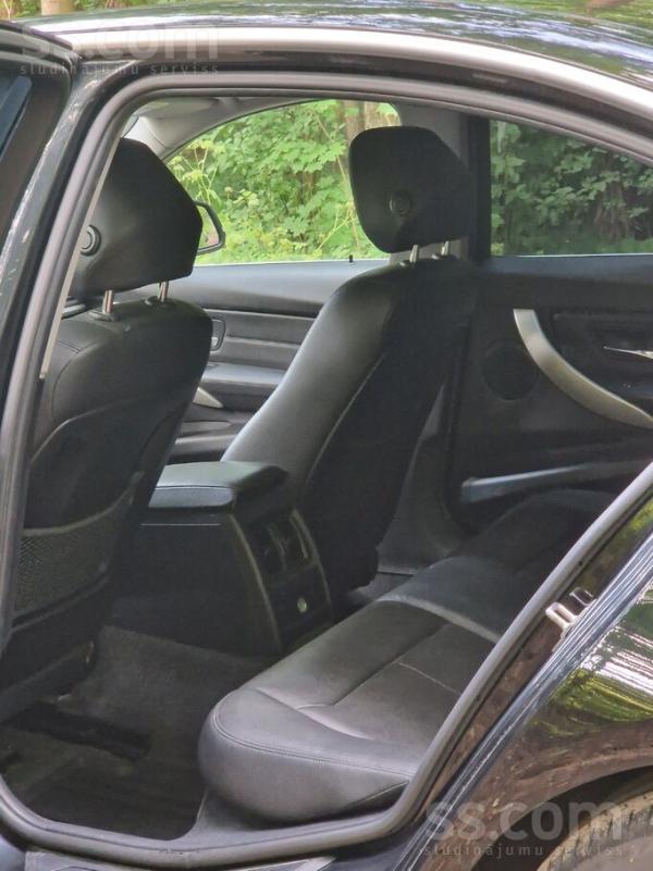 Black BMW 318 2015 in Riga, with an engine capacity of 2.00 L and mileage of 158 thousand km for 10500 €, photo 2 on AUTOMOTO.COM.LV