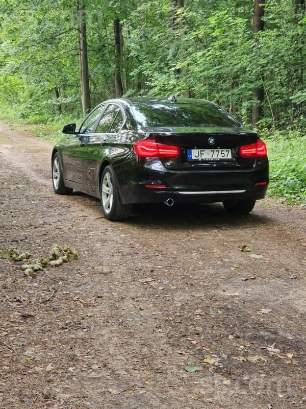 Black BMW 318 2015 in Riga, with an engine capacity of 2.00 L and mileage of 158 thousand km for 10500 €, photo 7 on AUTOMOTO.COM.LV