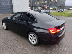 Black BMW 318 2016 in Riga, with an engine capacity of 2.00 L and mileage of 168 thousand km for 14950 €, photo 6 on AUTOMOTO.COM.LV