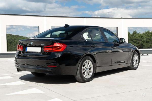 Black BMW 318 2017 in Vilnius, with an engine capacity of 1.50 L and mileage of 168 thousand km for 9900 €, photo 6 on AUTOMOTO.COM.LV