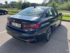 Black BMW 318 2019 in Vilnius, with an engine capacity of 2.00 L and mileage of 163 thousand km for 16599 €, photo 8 on AUTOMOTO.COM.LV