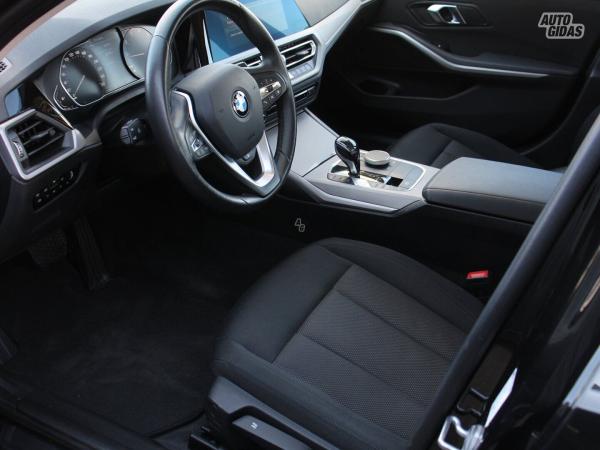 Black BMW 318 2021 in Vilnius, with an engine capacity of 2.00 L and mileage of 39 thousand km for 24750 €, photo 6 on AUTOMOTO.COM.LV