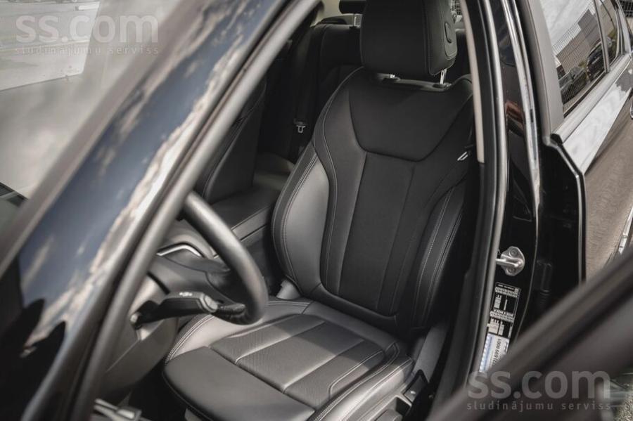 Black BMW 318 2022 in Riga, with an engine capacity of 2.00 L and mileage of 65 thousand km for 25800 €, photo 12 on AUTOMOTO.COM.LV