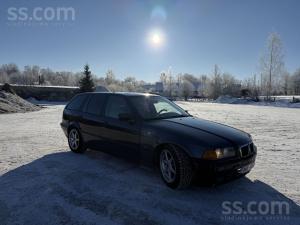 Black BMW 318 1997 in Cesis, with an engine capacity of 2.00 L and mileage of 386 thousand km for 2450 €, photo 3 on AUTOMOTO.COM.LV
