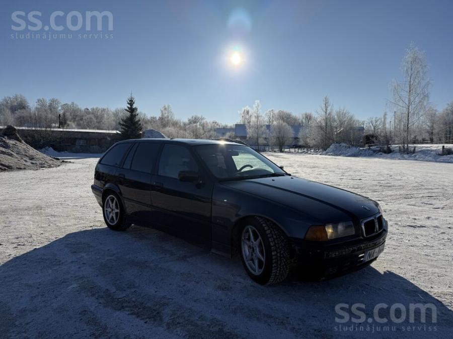 Black BMW 318 1997 in Cesis, with an engine capacity of 2.00 L and mileage of 386 thousand km for 2450 €, photo 3 on AUTOMOTO.COM.LV