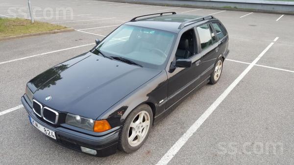 Black BMW 318 1998 in Riga, with an engine capacity of 1.80 L and mileage of 320 thousand km for 2100 €, photo 3 on AUTOMOTO.COM.LV