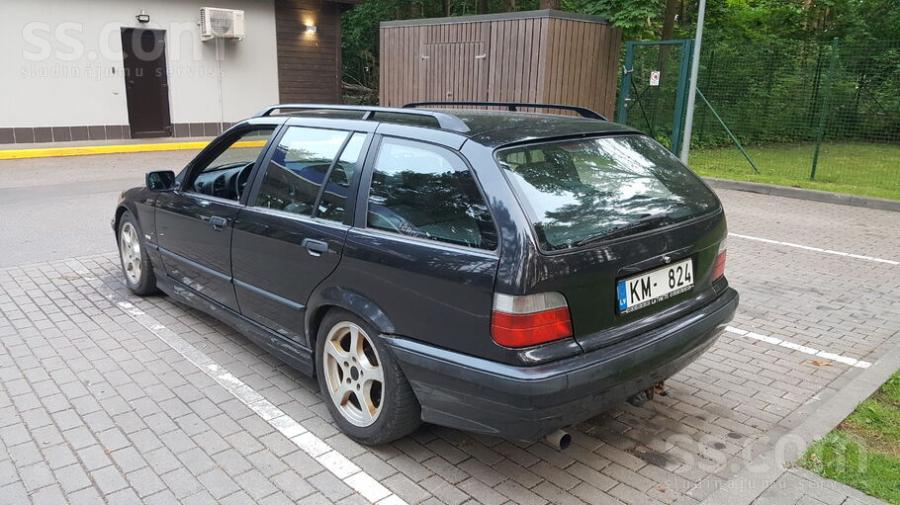 Black BMW 318 1998 in Riga, with an engine capacity of 1.80 L and mileage of 320 thousand km for 2100 €, photo 11 on AUTOMOTO.COM.LV