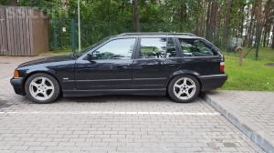 Black BMW 318 1998 in Riga, with an engine capacity of 1.80 L and mileage of 320 thousand km for 2100 €, photo 12 on AUTOMOTO.COM.LV