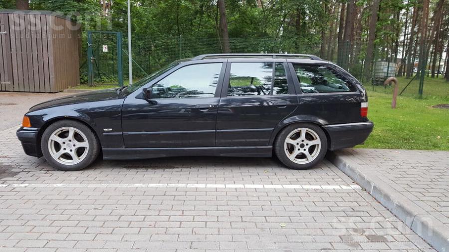 Black BMW 318 1998 in Riga, with an engine capacity of 1.80 L and mileage of 320 thousand km for 2100 €, photo 12 on AUTOMOTO.COM.LV