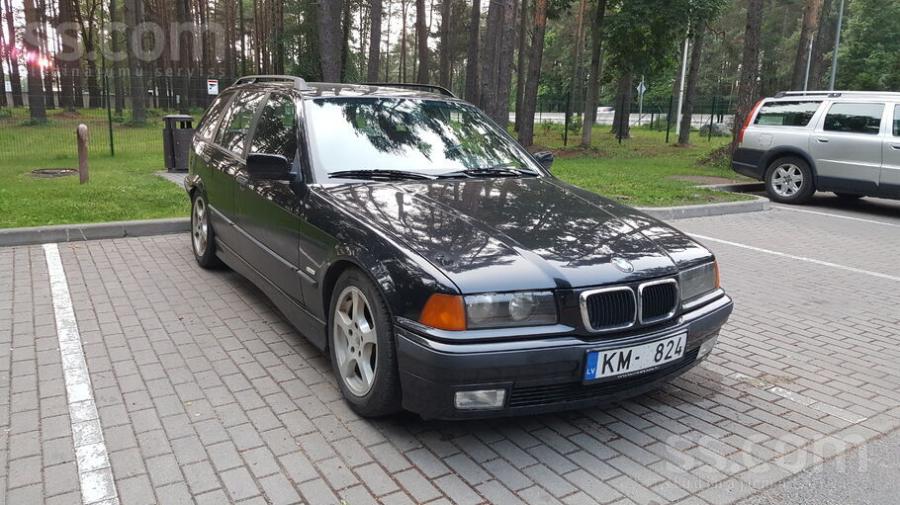 Black BMW 318 1998 in Riga, with an engine capacity of 1.80 L and mileage of 320 thousand km for 2100 €, photo 13 on AUTOMOTO.COM.LV