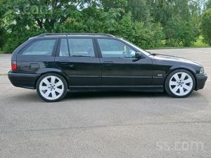 Black BMW 318 1998 in Dobele, with an engine capacity of 1.80 L and mileage of 320 thousand km for 2100 €, photo 2 on AUTOMOTO.COM.LV