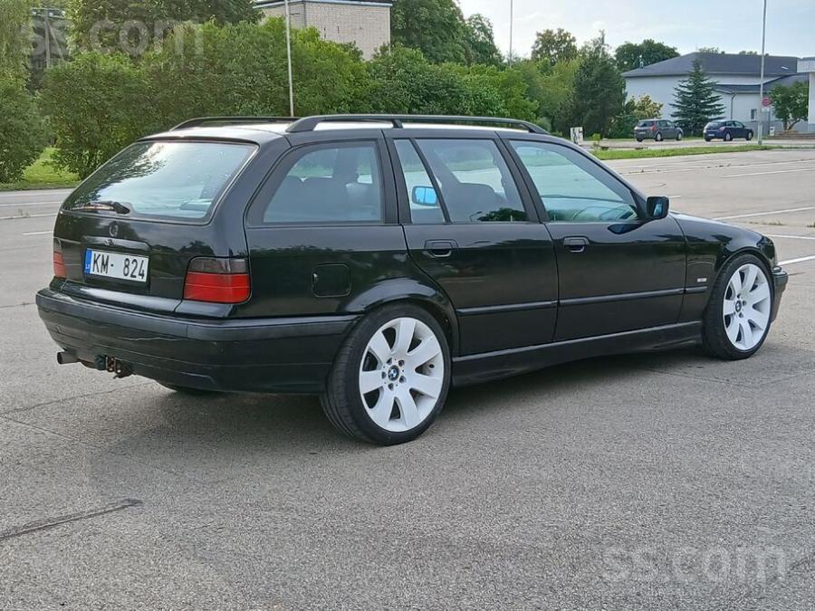 Black BMW 318 1998 in Dobele, with an engine capacity of 1.80 L and mileage of 320 thousand km for 2100 €, photo 3 on AUTOMOTO.COM.LV
