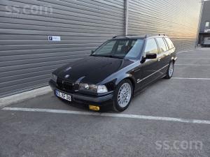 Melns BMW 318 1998 Rīga, ar dzinēja tilpumu 1.80 L un nobraukumu 314 tūkst. km par 2800 €, foto  vietnē AUTOMOTO.COM.LV