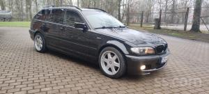 Black BMW 318 2005 in Riga, with an engine capacity of 2.00 L and mileage of 144 thousand km for 3890 €, photo 2 on AUTOMOTO.COM.LV