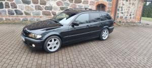 Black BMW 318 2005 in Riga, with an engine capacity of 2.00 L and mileage of 144 thousand km for 3890 €, photo 19 on AUTOMOTO.COM.LV
