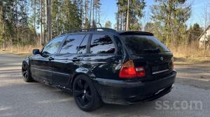 Black BMW 318 2005 in Riga, with an engine capacity of 1.80 L and mileage of 33 thousand km for 1700 €, photo 5 on AUTOMOTO.COM.LV