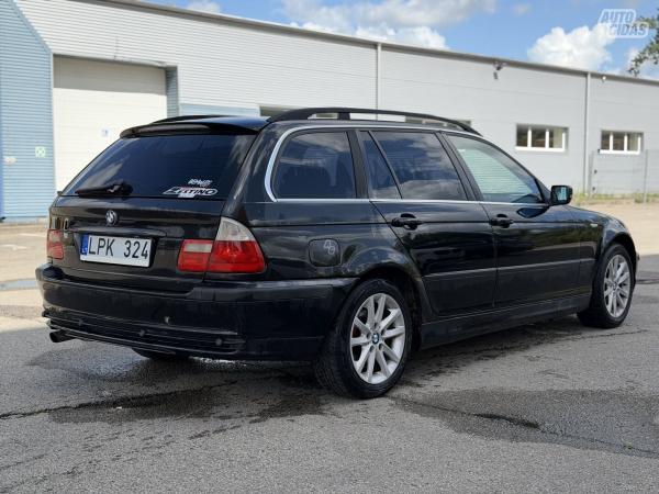 Black BMW 318 2005 in Siauliai, with an engine capacity of 2.00 L and mileage of 384 thousand km for 999 €, photo 4 on AUTOMOTO.COM.LV