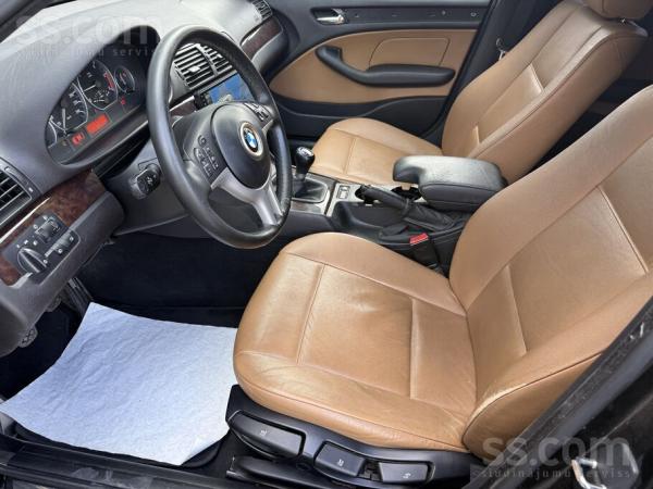 Black BMW 318 2005 in Riga, with an engine capacity of 2.00 L and mileage of 281 thousand km for 3300 €, photo 6 on AUTOMOTO.COM.LV
