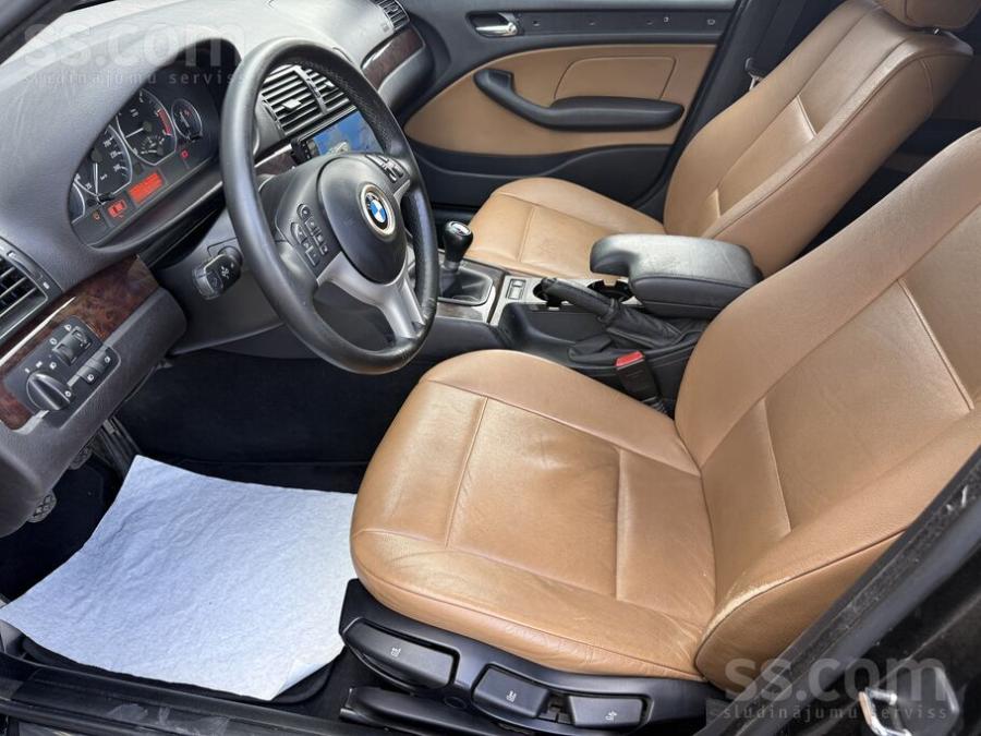 Melns BMW 318 2005 Rīga, ar dzinēja tilpumu 2.00 L un nobraukumu 281 tūkst. km par 3300 €, foto 6 vietnē AUTOMOTO.COM.LV