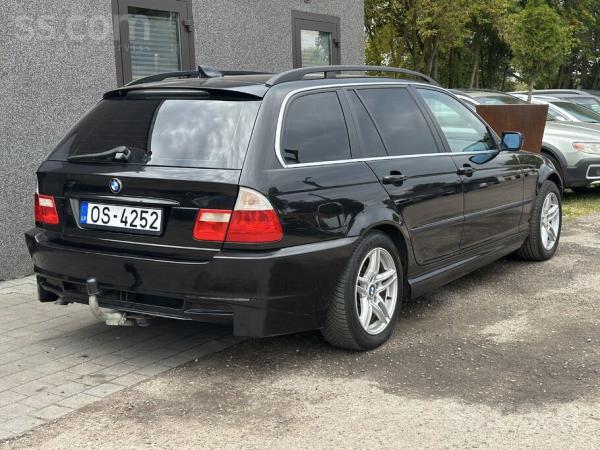Black BMW 318 2005 in Riga, with an engine capacity of 2.00 L and mileage of 281 thousand km for 3300 €, photo 6 on AUTOMOTO.COM.LV