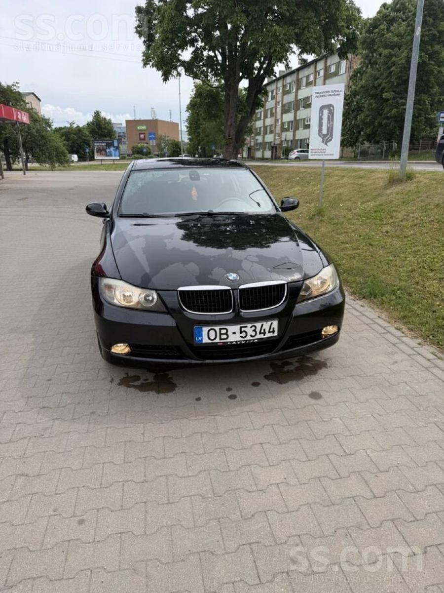 Black BMW 318 2007 in Riga, with an engine capacity of 2.00 L and mileage of 264 thousand km for 3400 €, photo 1 on AUTOMOTO.COM.LV