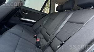 Black BMW 318 2008 in Riga, with an engine capacity of 2.00 L and mileage of 252 thousand km for 3990 €, photo 13 on AUTOMOTO.COM.LV