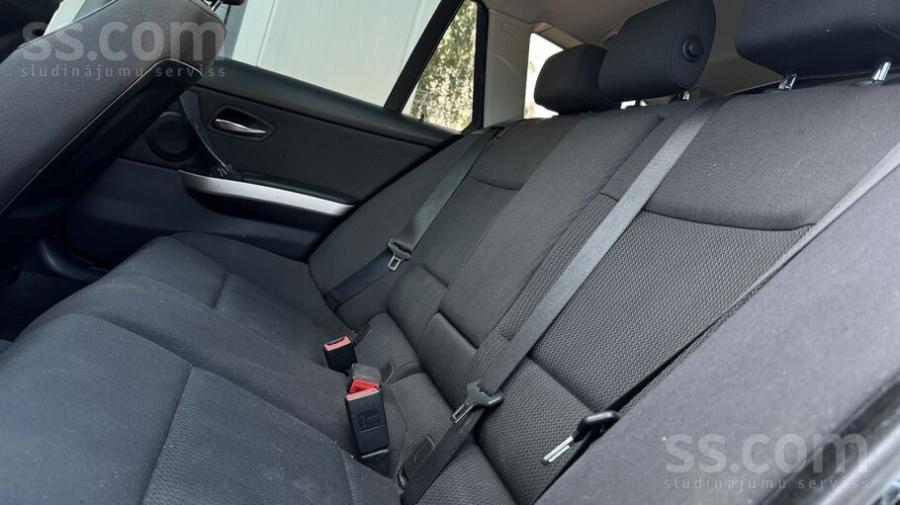Black BMW 318 2008 in Riga, with an engine capacity of 2.00 L and mileage of 252 thousand km for 3990 €, photo 13 on AUTOMOTO.COM.LV