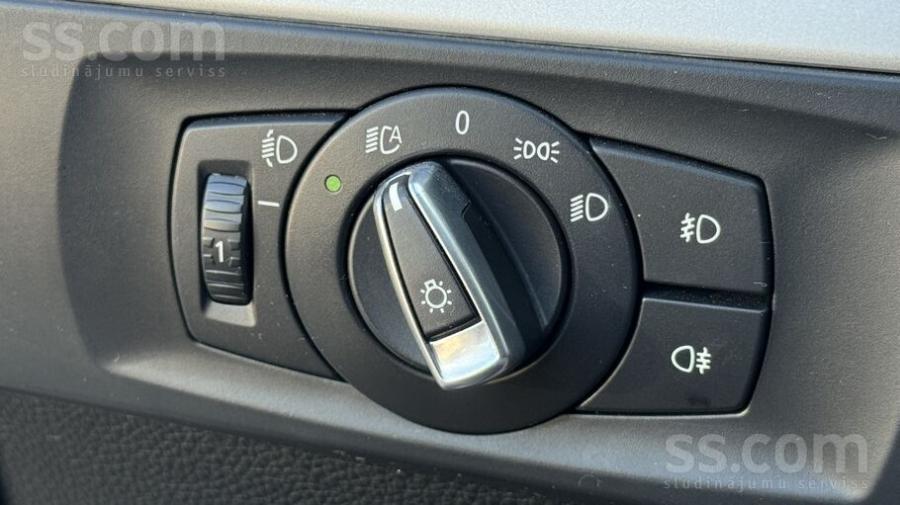 Black BMW 318 2008 in Riga, with an engine capacity of 2.00 L and mileage of 252 thousand km for 3990 €, photo 16 on AUTOMOTO.COM.LV