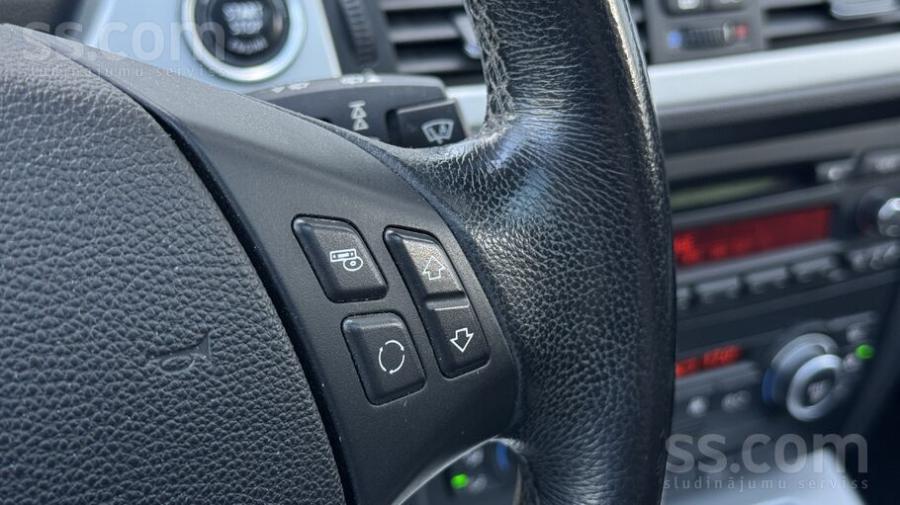 Black BMW 318 2008 in Riga, with an engine capacity of 2.00 L and mileage of 252 thousand km for 3990 €, photo 19 on AUTOMOTO.COM.LV