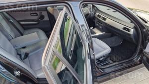 Black BMW 318 2008 in Jelgava, with an engine capacity of 2.00 L and mileage of 180 thousand km for 3950 €, photo 21 on AUTOMOTO.COM.LV