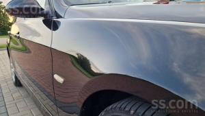 Black BMW 318 2008 in Jelgava, with an engine capacity of 2.00 L and mileage of 180 thousand km for 3950 €, photo 22 on AUTOMOTO.COM.LV