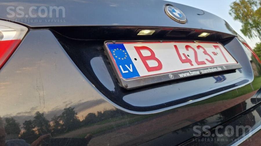 Black BMW 318 2008 in Jelgava, with an engine capacity of 2.00 L and mileage of 180 thousand km for 3950 €, photo 34 on AUTOMOTO.COM.LV