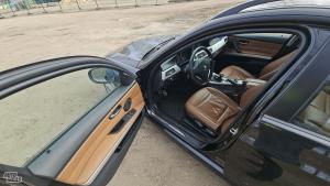Black BMW 318 2009 in Siauliai, with an engine capacity of 2.00 L and mileage of 200 thousand km for 4390 €, photo 15 on AUTOMOTO.COM.LV