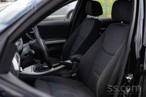 Black BMW 318 2009 in Riga, with an engine capacity of 2.00 L and mileage of 307 thousand km for 5590 €, photo 12 on AUTOMOTO.COM.LV