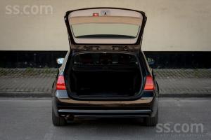 Black BMW 318 2009 in Talsi, with an engine capacity of 2.00 L and mileage of 296 thousand km for 4950 €, photo 7 on AUTOMOTO.COM.LV