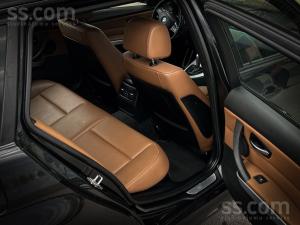 Black BMW 318 2010 in Tukums, with an engine capacity of 2.00 L and mileage of 376 thousand km for 6350 €, photo 21 on AUTOMOTO.COM.LV