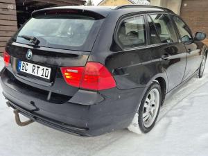 Black BMW 318 2011 in Siauliai, with an engine capacity of 2.00 L and mileage of 270 thousand km for 4650 €, photo 6 on AUTOMOTO.COM.LV