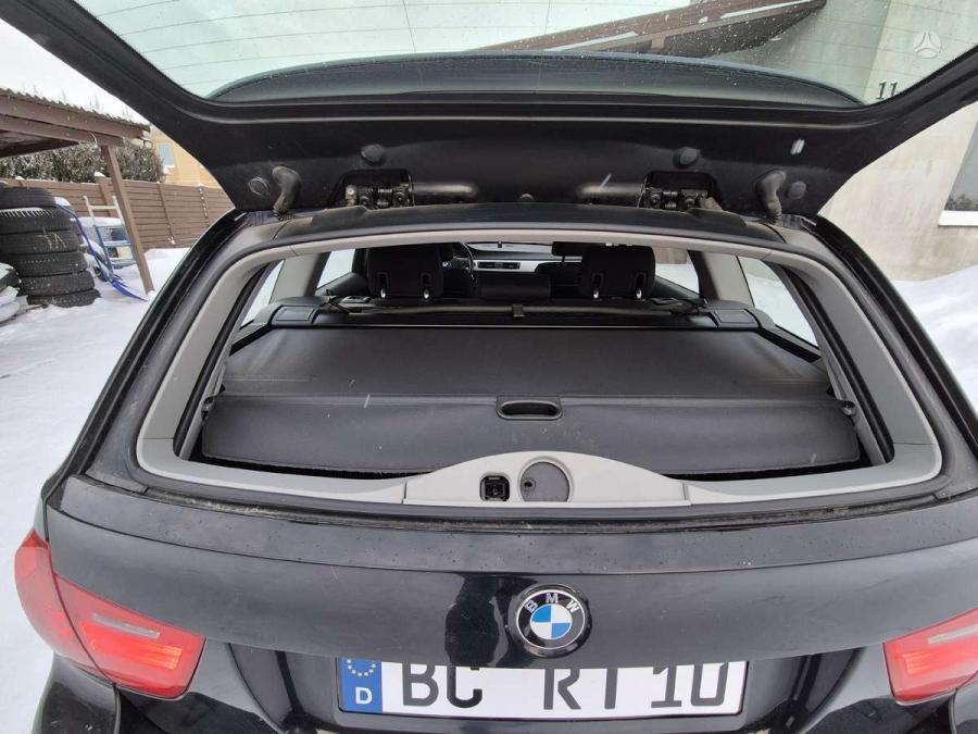 Black BMW 318 2011 in Siauliai, with an engine capacity of 2.00 L and mileage of 270 thousand km for 4650 €, photo 9 on AUTOMOTO.COM.LV
