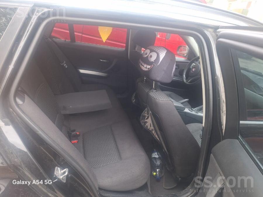 Black BMW 318 2011 in Ogre, with an engine capacity of 2.00 L and mileage of 395 thousand km for 3000 €, photo 22 on AUTOMOTO.COM.LV