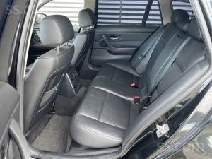 Black BMW 318 2011 in Riga, with an engine capacity of 2.00 L and mileage of 263 thousand km for 5200 €, photo 23 on AUTOMOTO.COM.LV