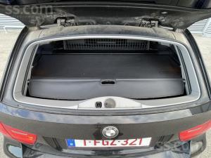 Black BMW 318 2011 in Riga, with an engine capacity of 2.00 L and mileage of 263 thousand km for 5200 €, photo 29 on AUTOMOTO.COM.LV