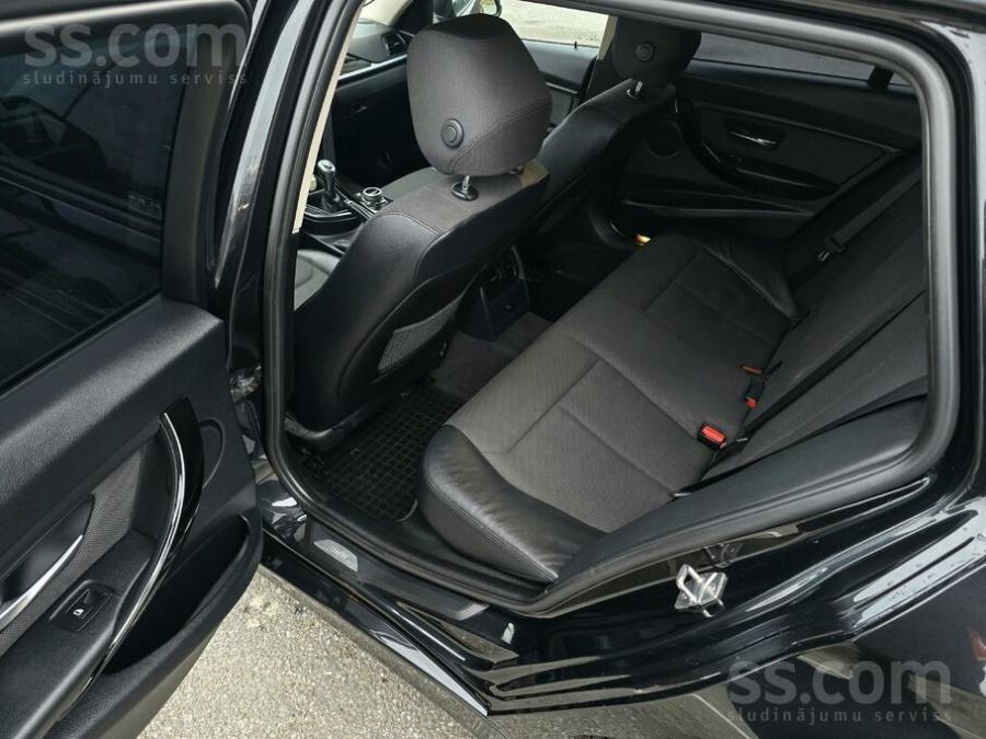 Black BMW 318 2012 in Valmiera, with an engine capacity of 2.00 L and mileage of 273 thousand km for 8650 €, photo 8 on AUTOMOTO.COM.LV