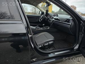 Black BMW 318 2012 in Valmiera, with an engine capacity of 2.00 L and mileage of 273 thousand km for 8650 €, photo 9 on AUTOMOTO.COM.LV