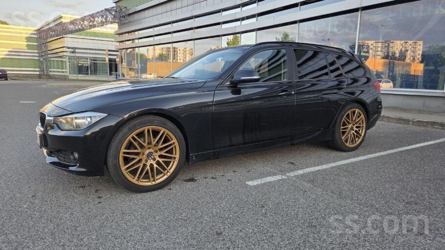 Black BMW 318 2012 in Riga, with an engine capacity of 2.00 L and mileage of 247 thousand km for 5950 €, photo 1 on AUTOMOTO.COM.LV